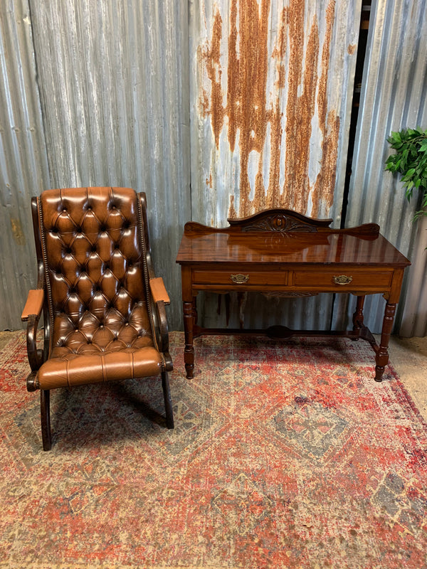 A brown leather button back slipper chair - Belle and Beast Emporium