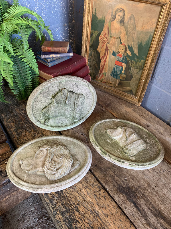 An oval cast stone plaque depicting a dog's head in profile ~C - Belle ...