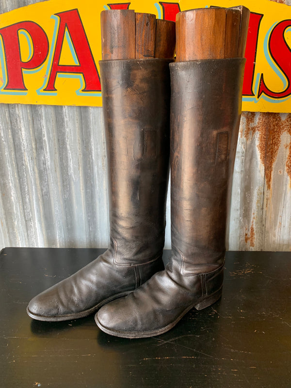 An old pair of black leather riding boots with wooden lasts - Belle and ...