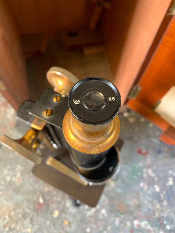 A Watson Service brass monocular microscope in original wooden case ...