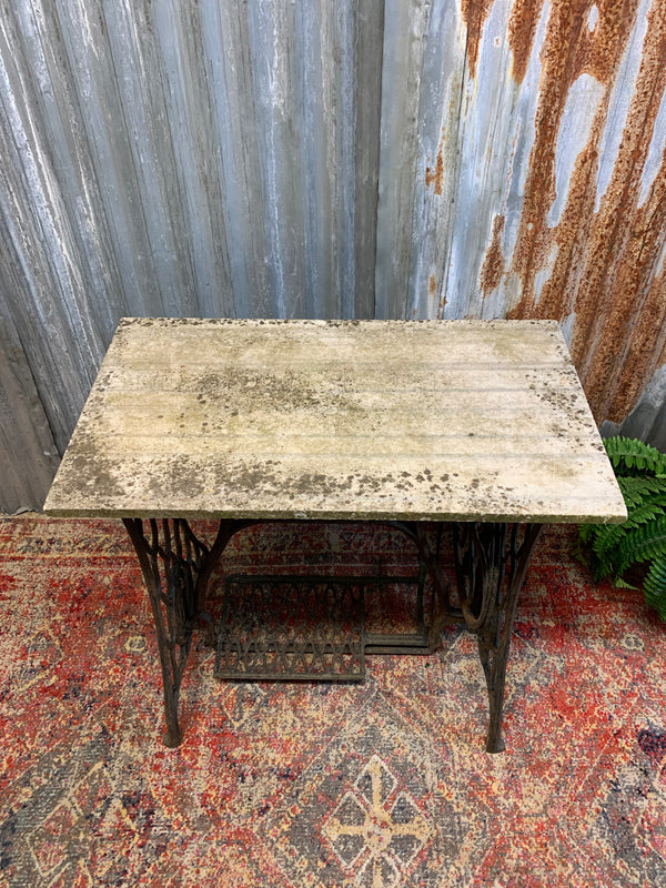 A cast iron Singer sewing table with marble top - Belle and Beast Emporium