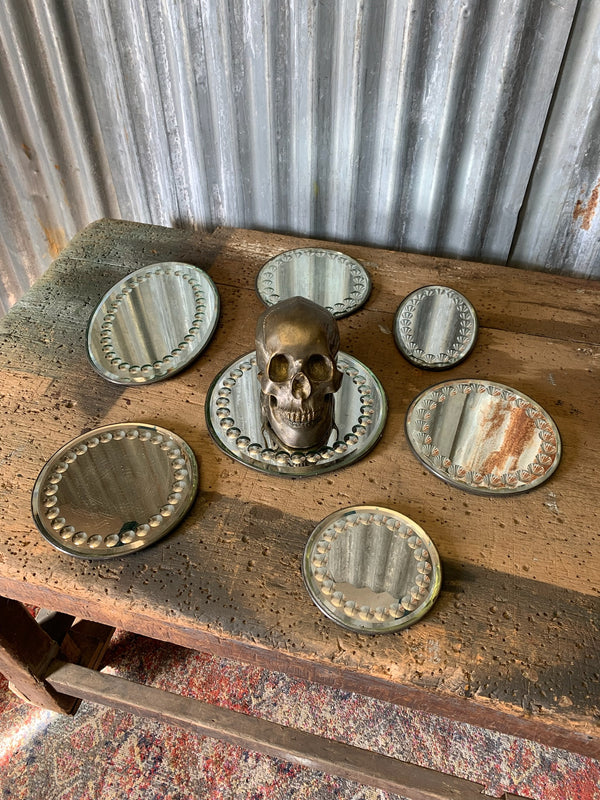 A collection of seven sorcerer's mirrors - Belle and Beast Emporium