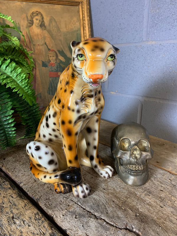 A large ceramic seated leopard statue - Belle and Beast Emporium