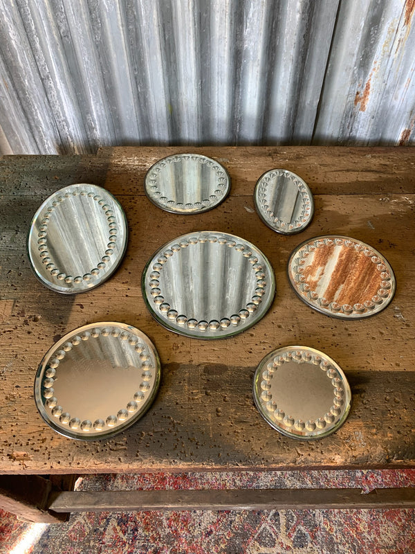 A collection of seven sorcerer's mirrors - Belle and Beast Emporium