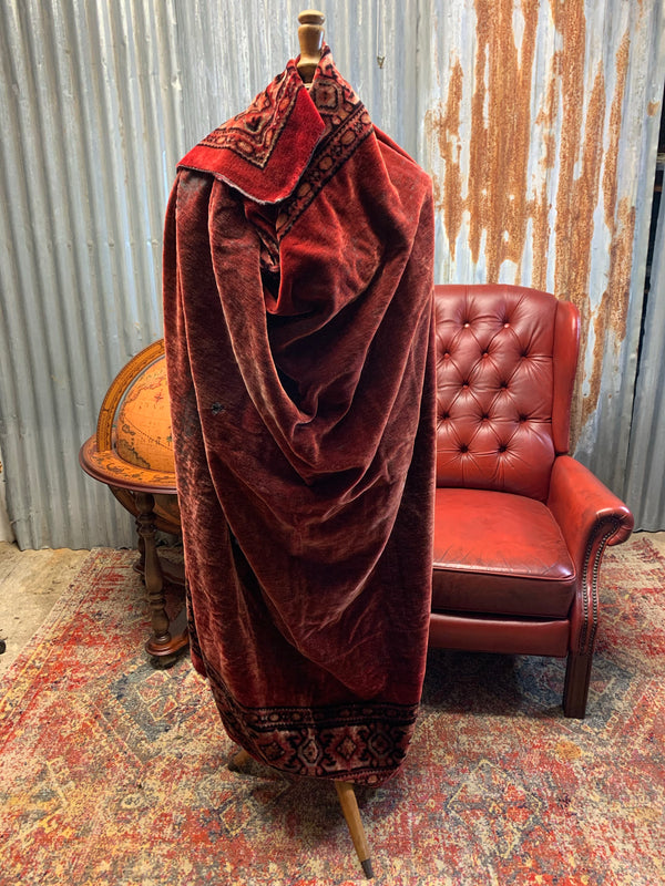 A large worn red velvet throw - Belle and Beast Emporium