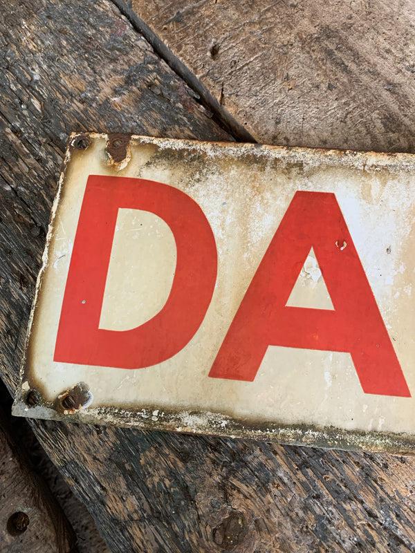 A red and white enamel DANGER sign - Belle and Beast Emporium